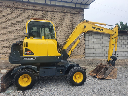 Ekskavator Hyundai 555w-7 srochniy sotiladi  kamplekt kovushi bor