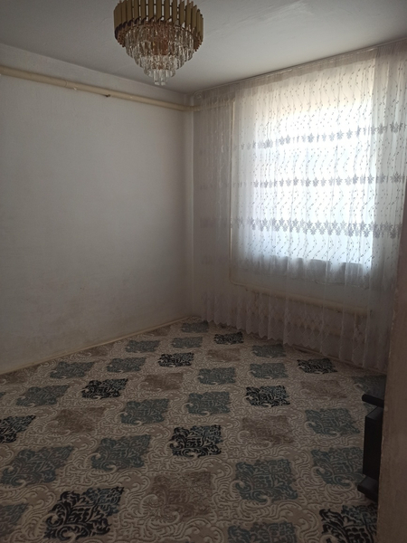 Кунград. К Абдров дом 64г 4 этажда 3 ханалы уй сатылады.