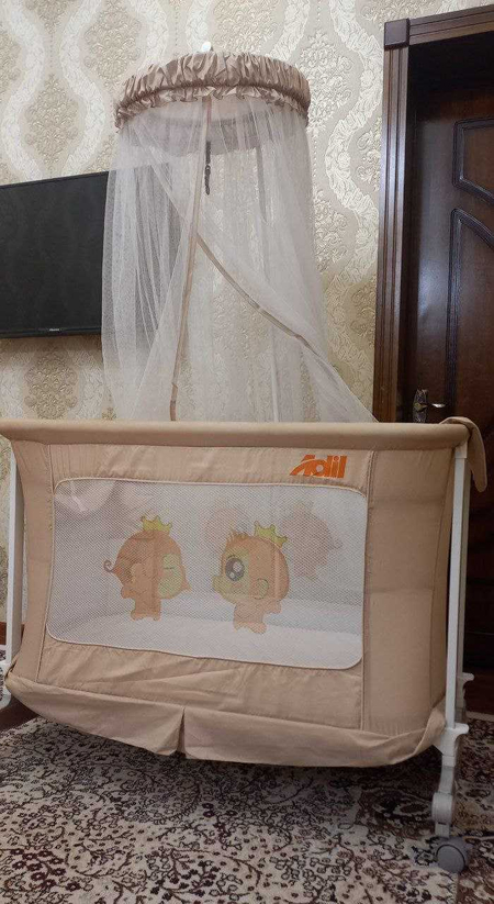 Новую Детскую кровать-люльку манеж три в одном.