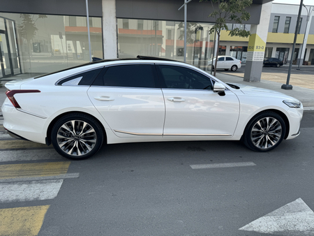 KIA K8  23000 km kraska toza xolati zor