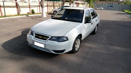 Chevrolet Nexia 1.6 DOHC 2012г. Белая (10U).