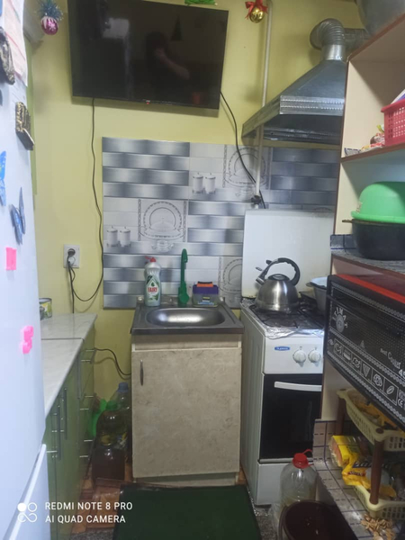 Продается квартира на втором этаже двух этажного дома в городе Каган