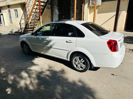 Lacetti 1,8 2010 xolati yahwi