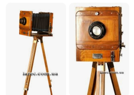 Коллекционная модель старого фотоаппарата на треноге советского периоа