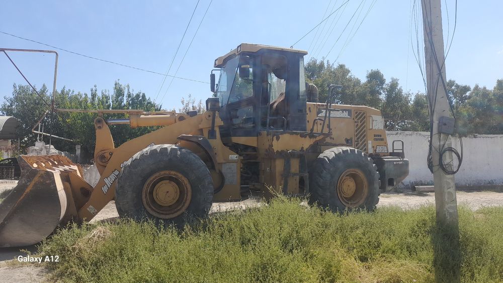 Пагрусчик 2014й 28000$ 3.3 куб сотилади