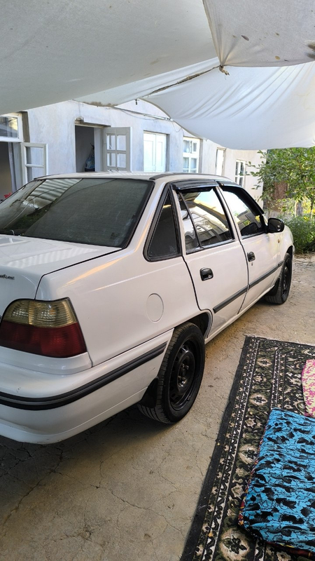 Nexia 1 yili 2001