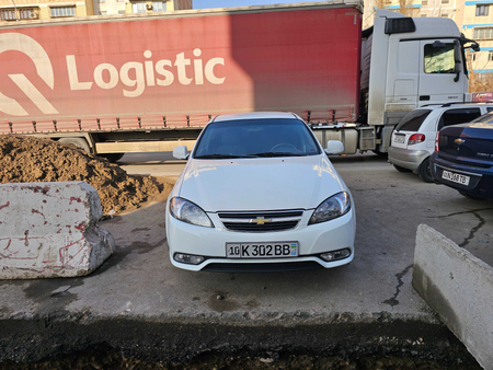 Lacetti 2013 oq 1,8 gentra qilingan