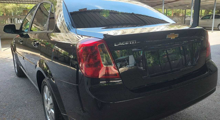 Новая чёрная Gentra/Lacetti
