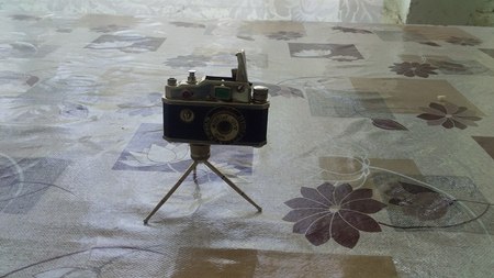 Фотоаппаратное зажигалка