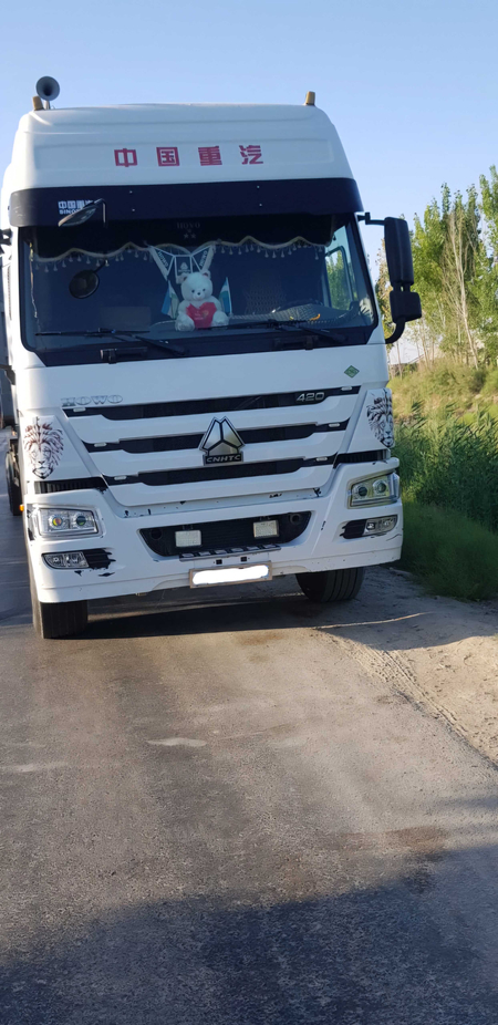 Тягач SINOTRUK HOWO A6 ва прицеп.