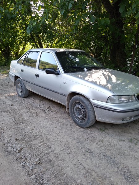Nexia 1 yili 2004 metan 90 talik