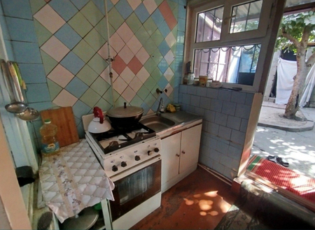 Продается дом ( квартира на земле )Мирабадский район ориентир Обл воен