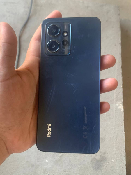 Redmi not 12 joyi 8/256 orqasidan qirilgan joylari bor