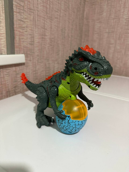 Игрушка динозавр