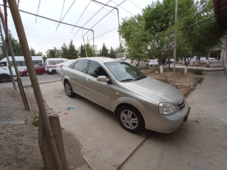 Lacetti 1.8 сотилади. Метан гази бор.