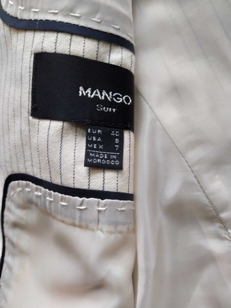 Брючный костюм в полоску Mango