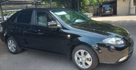 Новая чёрная Gentra/Lacetti