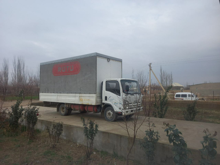 Isuzi snj tentli furgon 40m³ yili 2009 ishga tayyor narxi 25000 kami