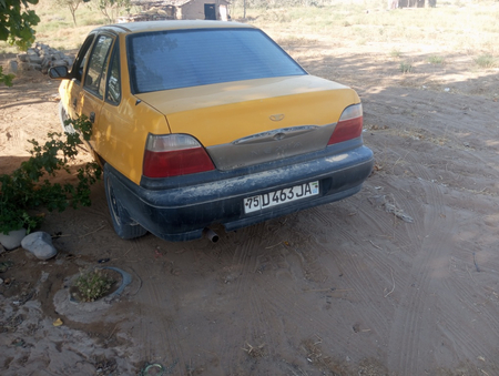 Moshinni holati yaxshi yili 2005 rangi metalka 80 talik metan benzinga