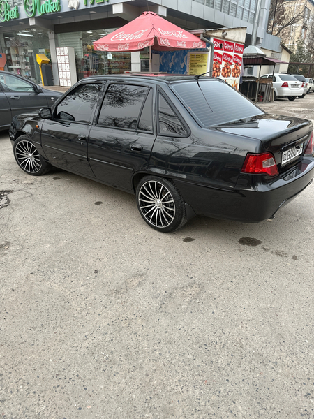 Nexia 2 Rangi qora 30.000 km yurgan Kraskasi toza tyuning qilingan!!!
