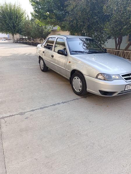 Nexia 2  1.6 luks kansaner 2009 yil metani bor matori qilingan