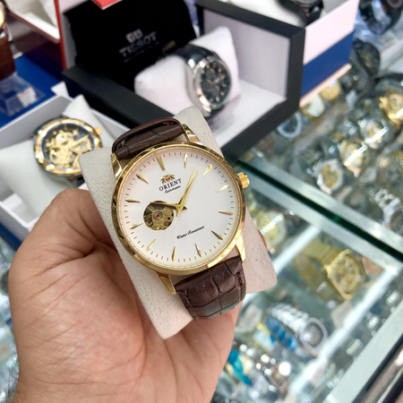 Часы механические Orient с кожаным ремешком