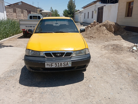 Nexia 1 yili 2003 sons tramblyor sariq