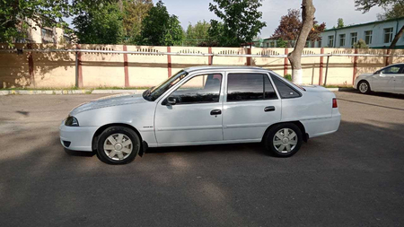 Chevrolet Nexia 1.6 DOHC 2012г. Белая (10U).
