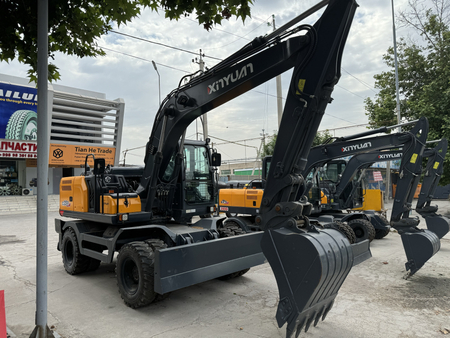 Колесный экскаватор C150W 0.55 куб