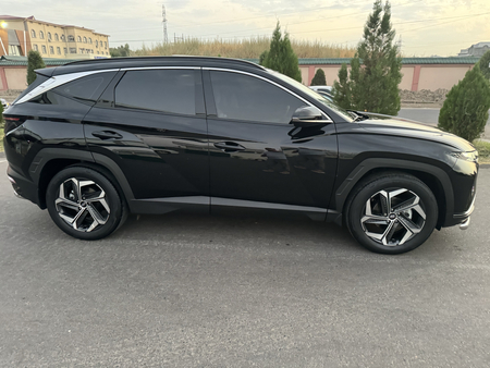 TUCSON FUUL 2litr qora toza 22yil oq salon