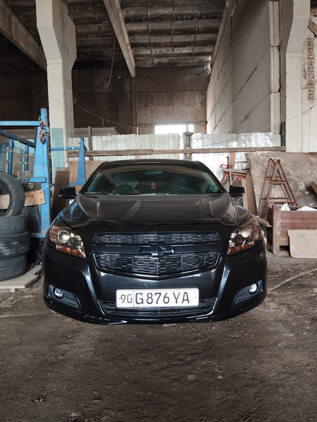 Malibu 1 qora rang 2013 yil mashina tetik xolatda