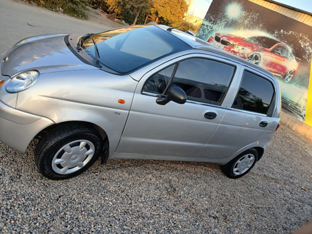 Matiz lyuks bez kondyor 2010 yil. Metan. Balonlari yangi.