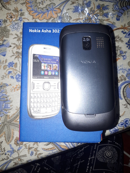 Сотовый телефон nokia Asha 302 телефон с коробкой зарядки нет