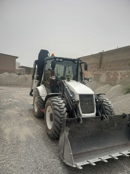 Экскаватор погрузчик Hidromek HMK102S с гидромолотом
