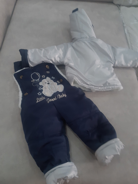 Продам  тёплый комбинезон на мальчиков.