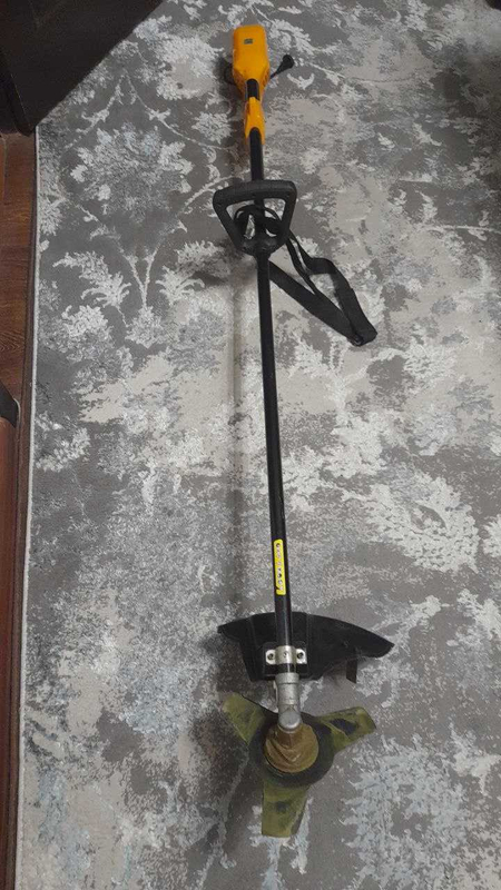 Мощный триммер фирмы ROLF7A225. 700 W. 10000 об. в мин.
